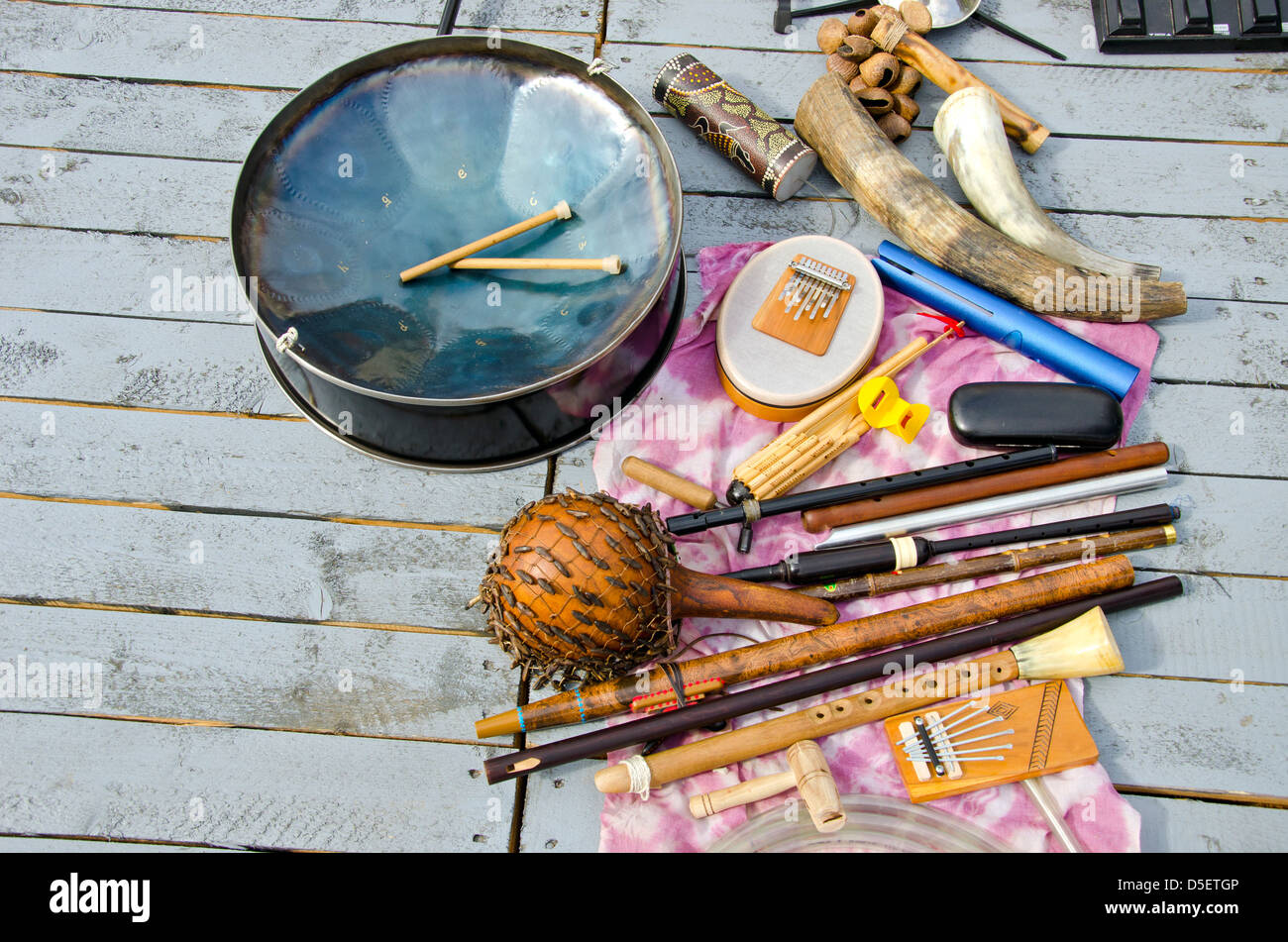 many various original musical instruments on wooden background Stock ...
