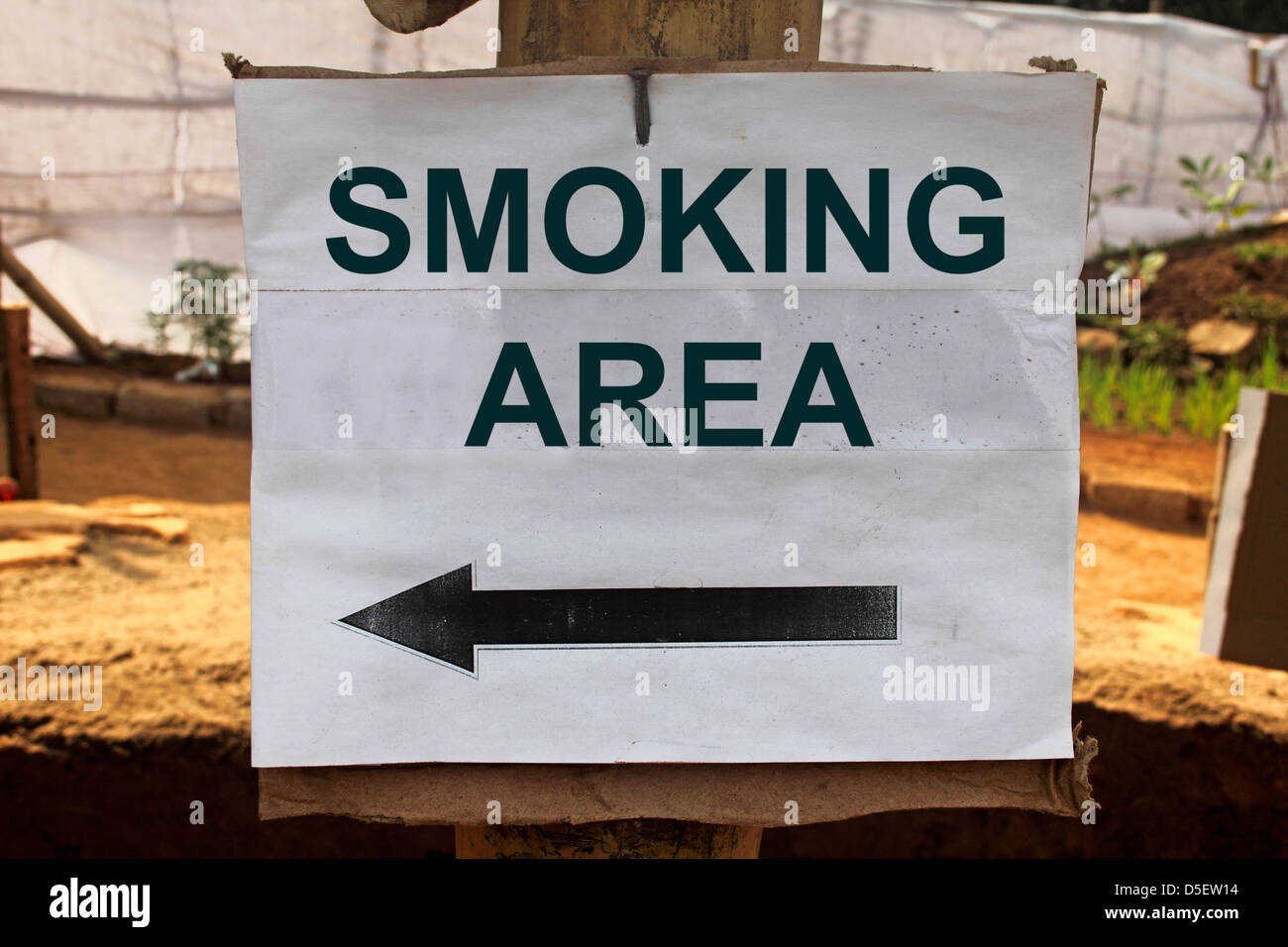 A noticeboard indicating Smoking Area Stock Photo - Alamy
