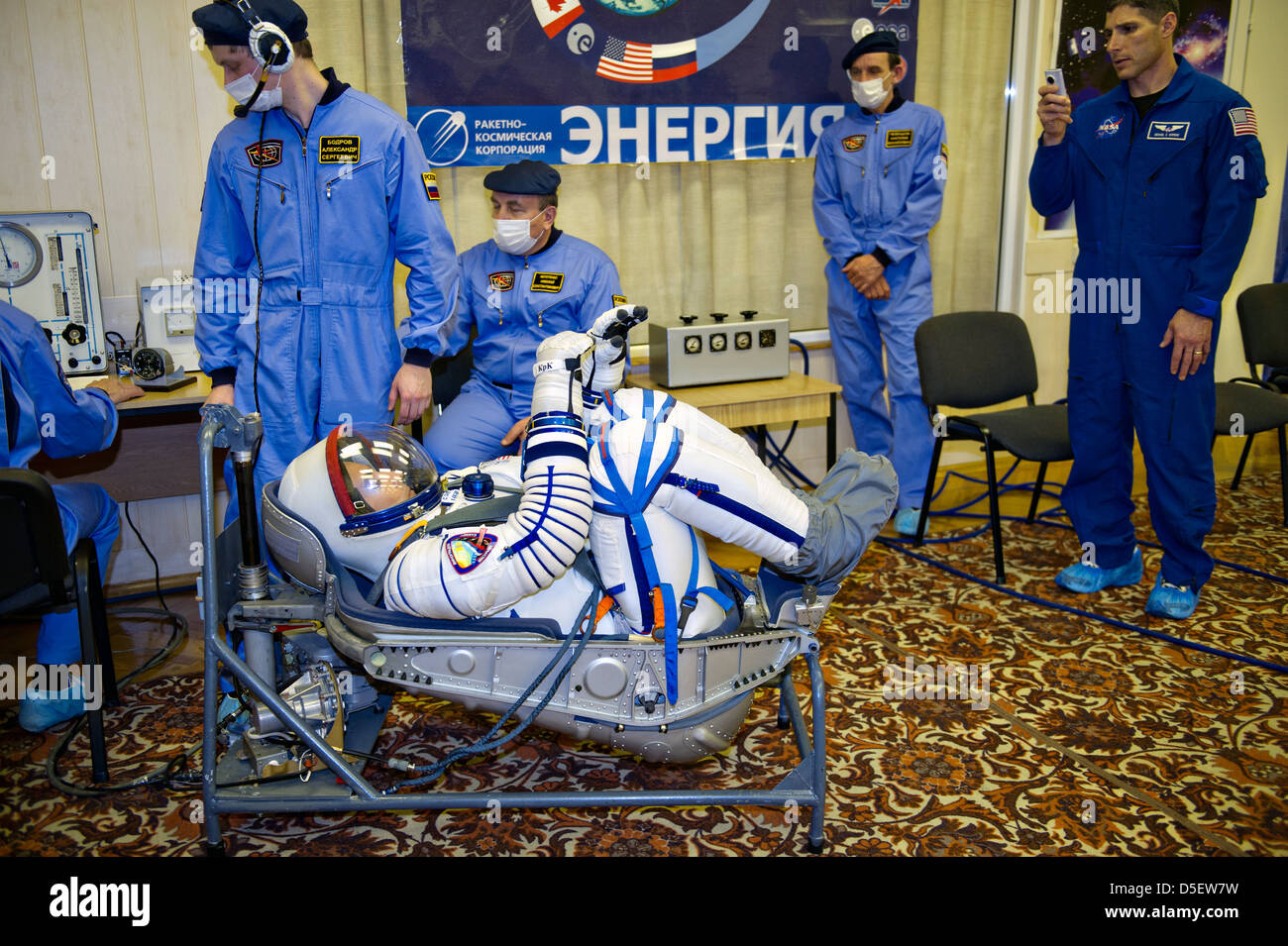 Expedition 35 NASA Flight Engineer Chris Cassidy has his Russian Sokol ...