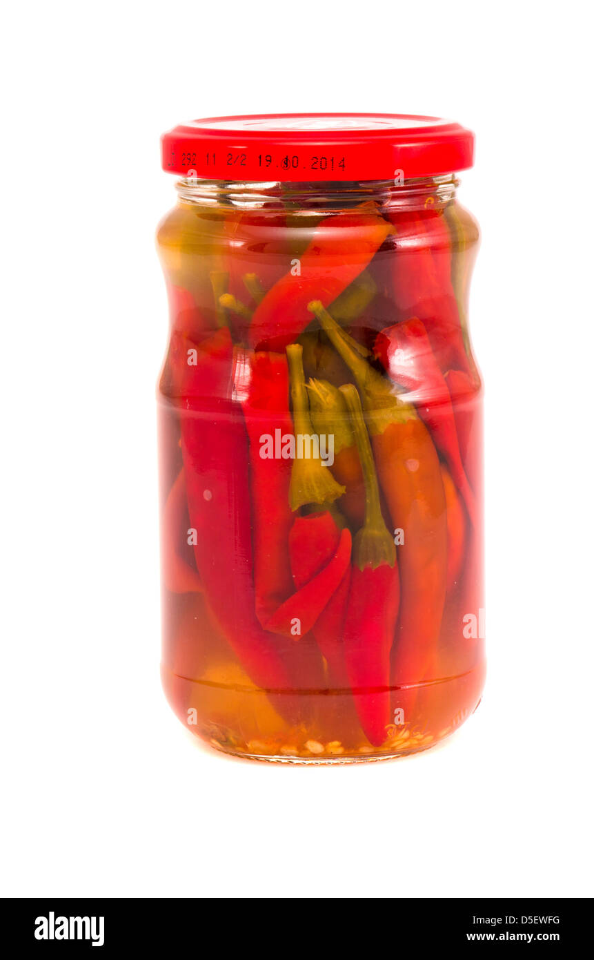 pickled red chilli peppers in glass jar isolated on white Stock Photo ...
