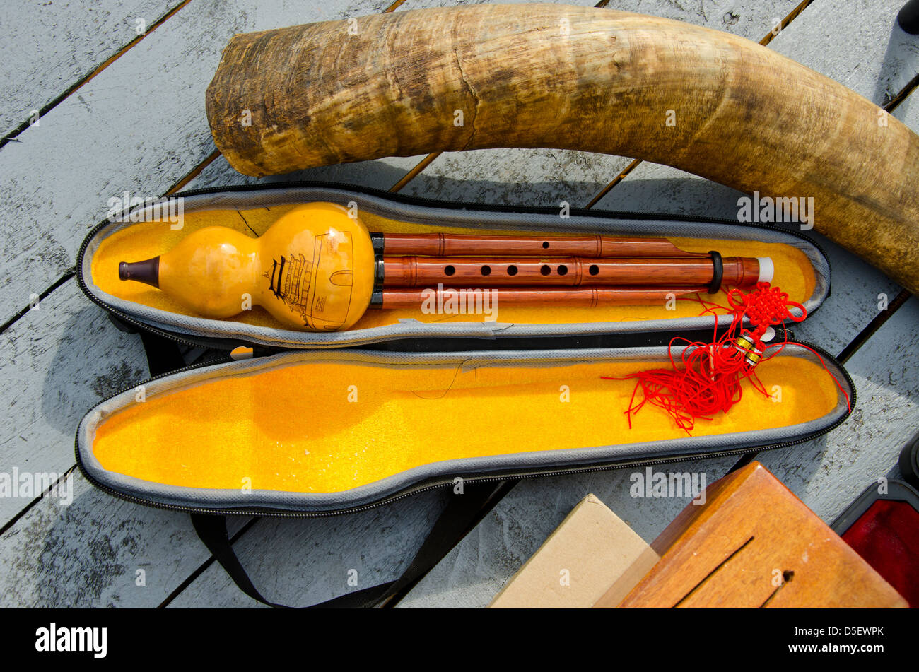 musical sound instruments on wooden background Stock Photo - Alamy