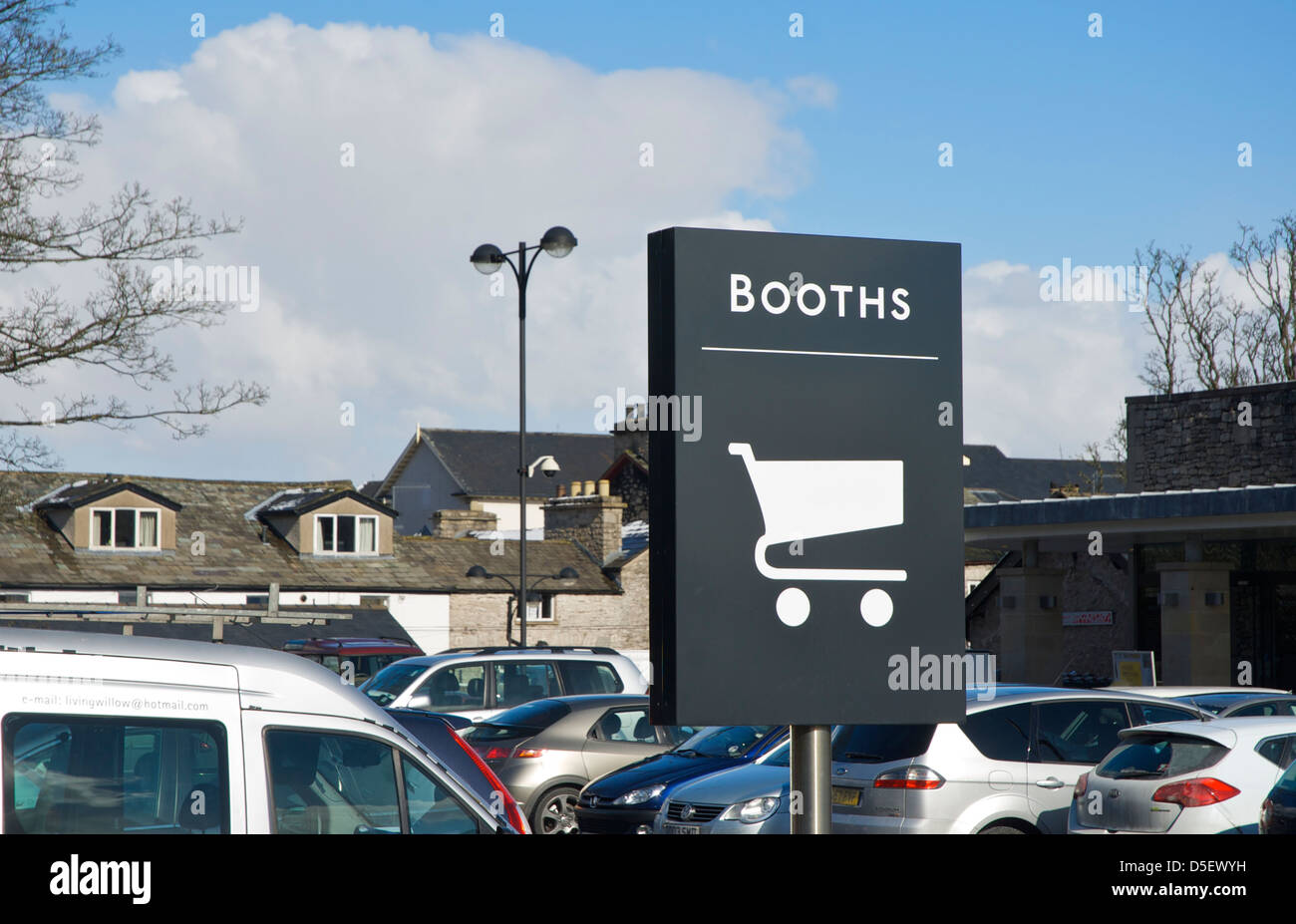Sign for trolley park in car-park of Booths supermarket, Kendal ...