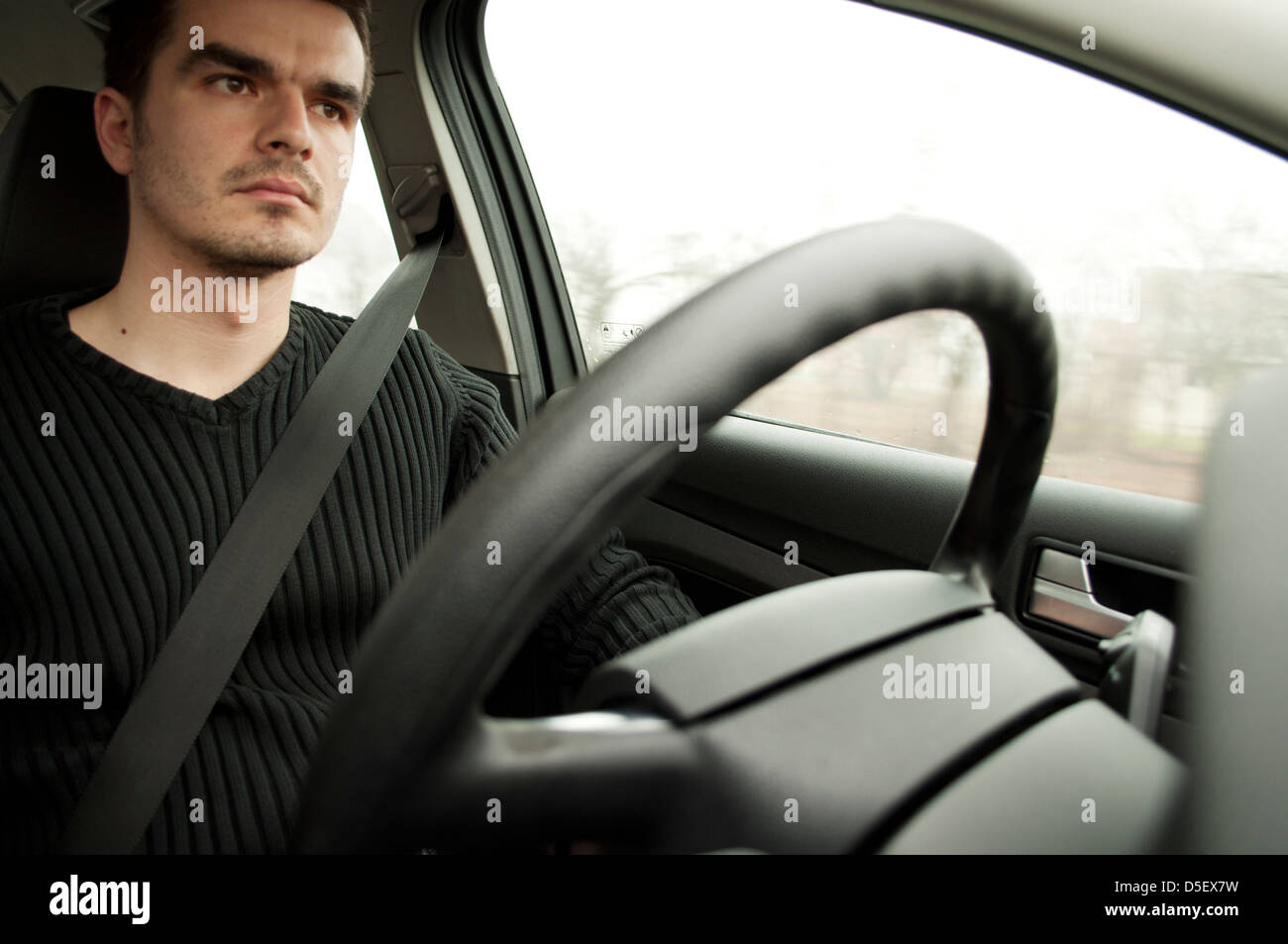 Man driving car in hi-res stock photography and images - Alamy