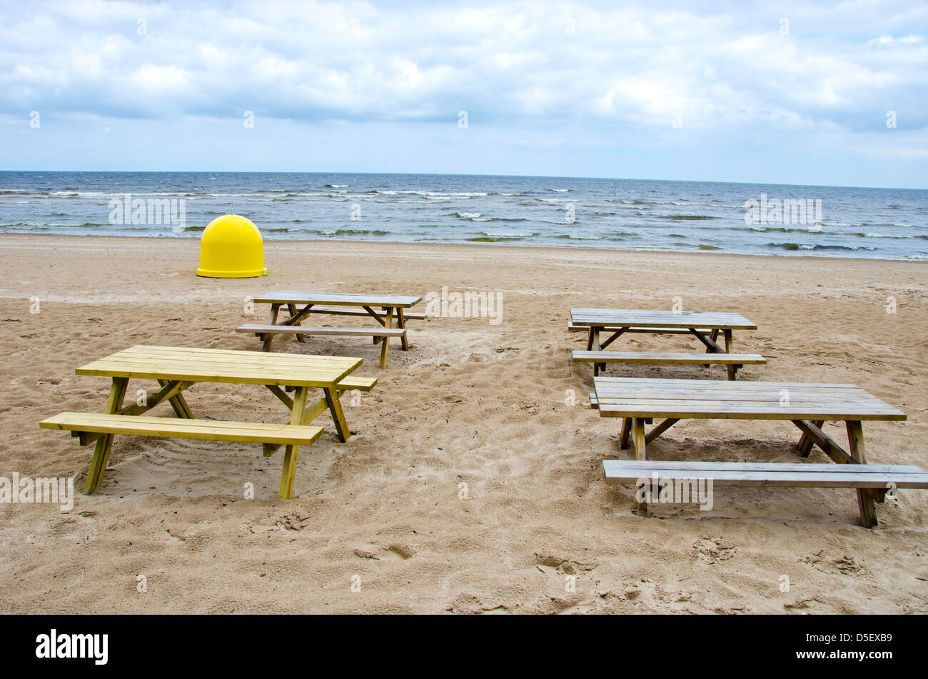summer season cafe tables on sea beach sand in morning Stock Photo - Alamy