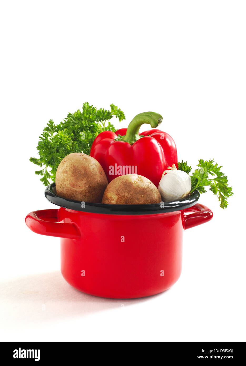Vegetables in a cooking pot over white Stock Photo - Alamy