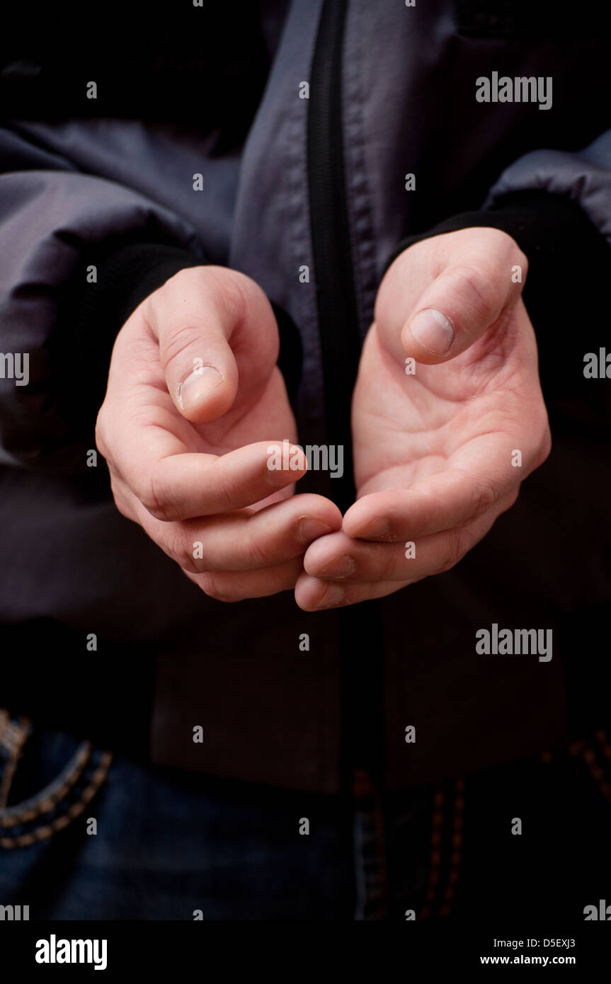 Begging hands hi-res stock photography and images - Alamy