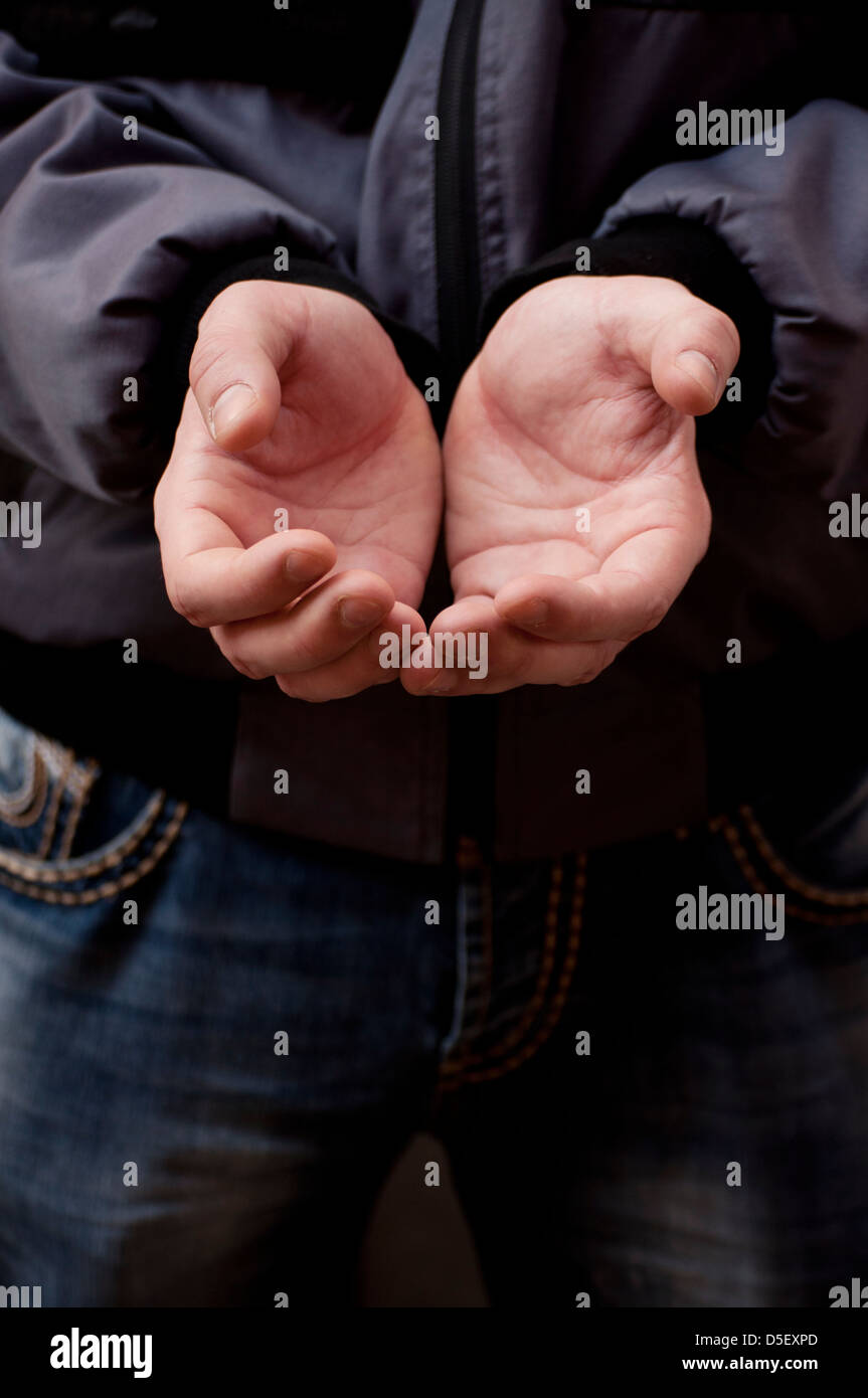 Begging hands hi-res stock photography and images - Alamy
