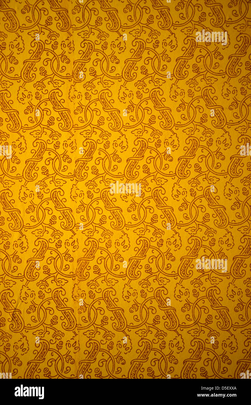 ancient yellow and ornamental wallpaper wall background Stock Photo - Alamy