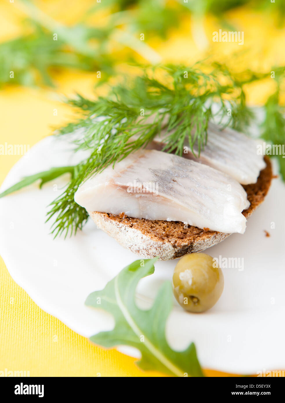 Herring bites fish hi-res stock photography and images - Alamy