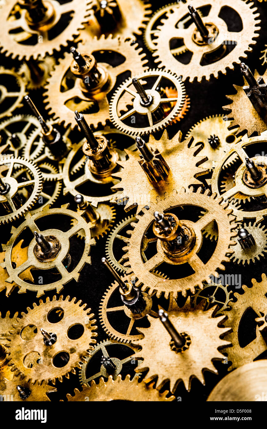 close up old mechanism on a black background Stock Photo - Alamy