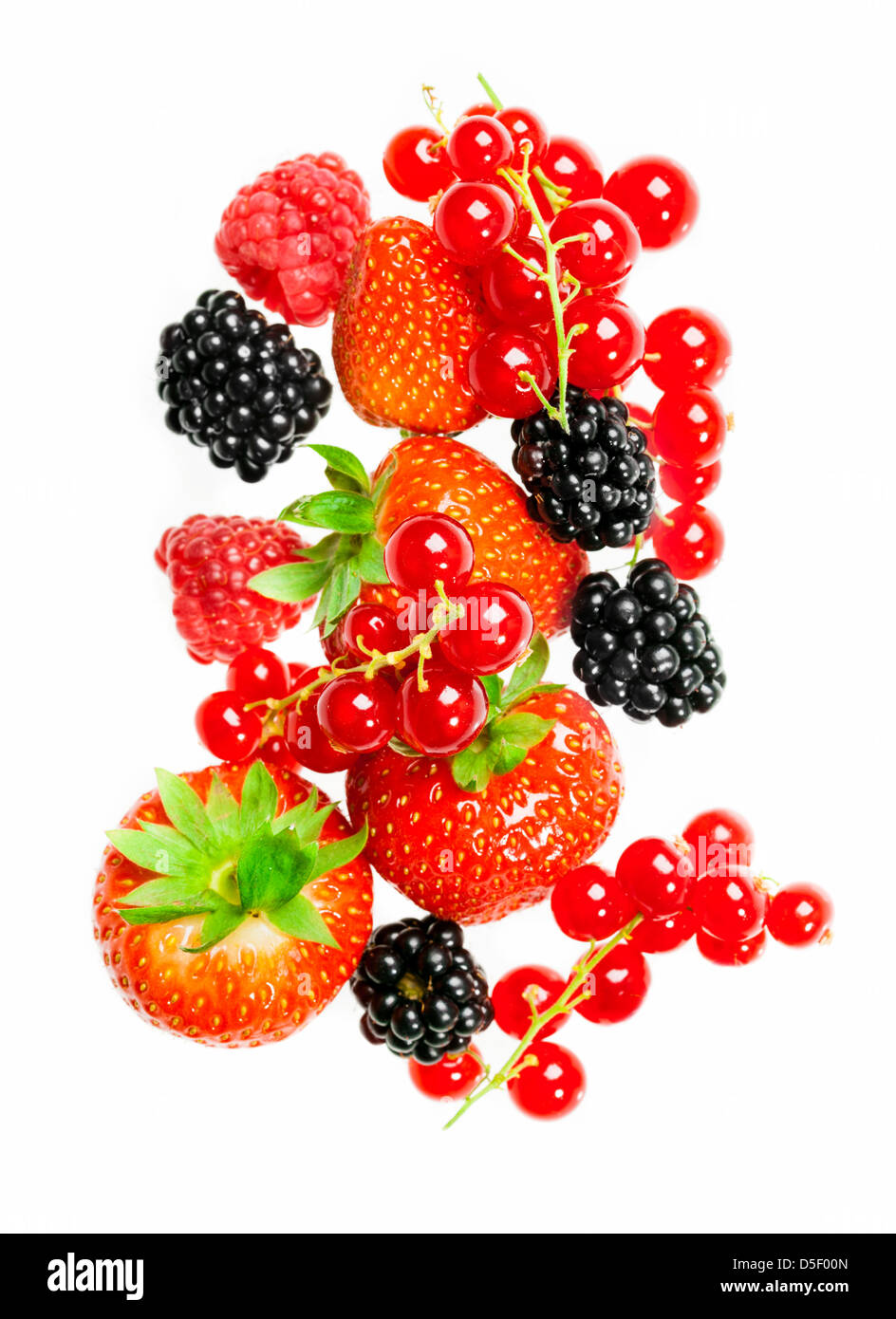 Different fresh berries on a white background Stock Photo - Alamy