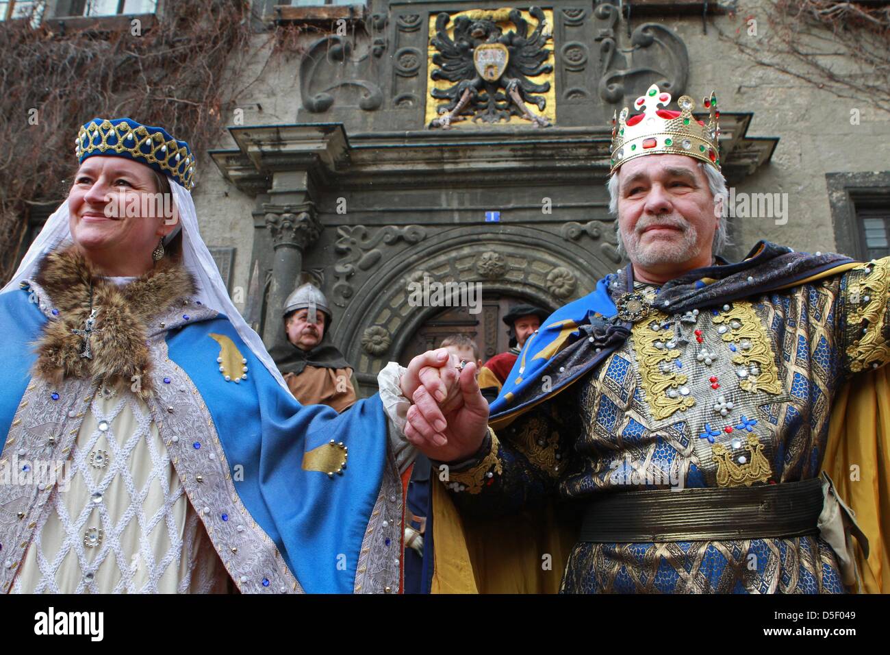People dressed as German kings take part in an Easter procession ...