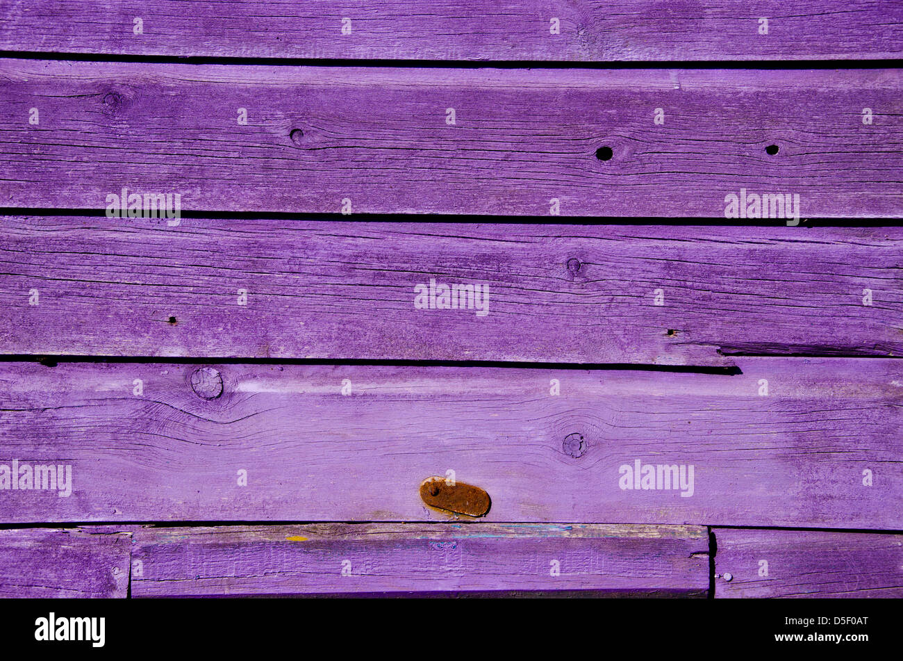 old wooden hive wall violet background and texture Stock Photo - Alamy