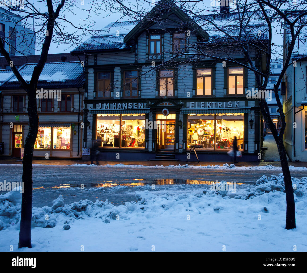 Norwegian Shop light up at twilight Stock Photo - Alamy