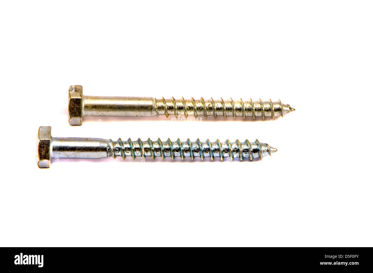two new screw nails isolated on white background Stock Photo - Alamy