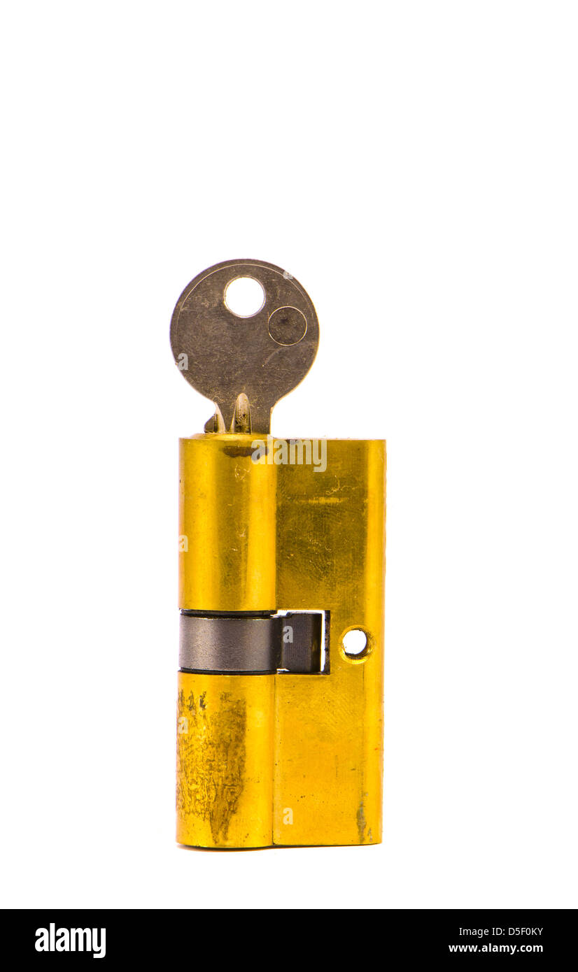 old lock brass cartridge cylinder with key isolated on white Stock ...