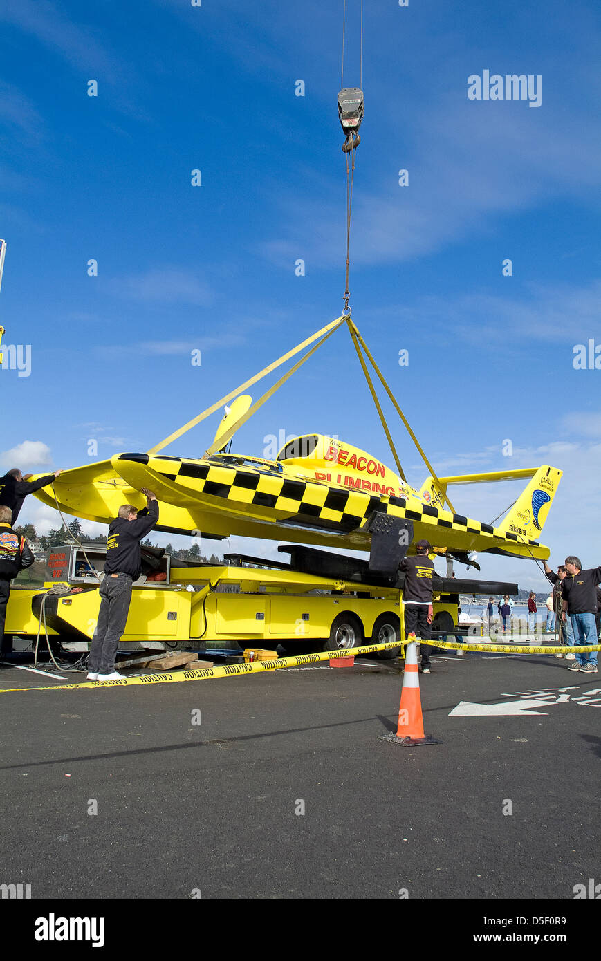 U-37 Miss Beacon Plumbing hydroplane being hoisted after practice runs ...