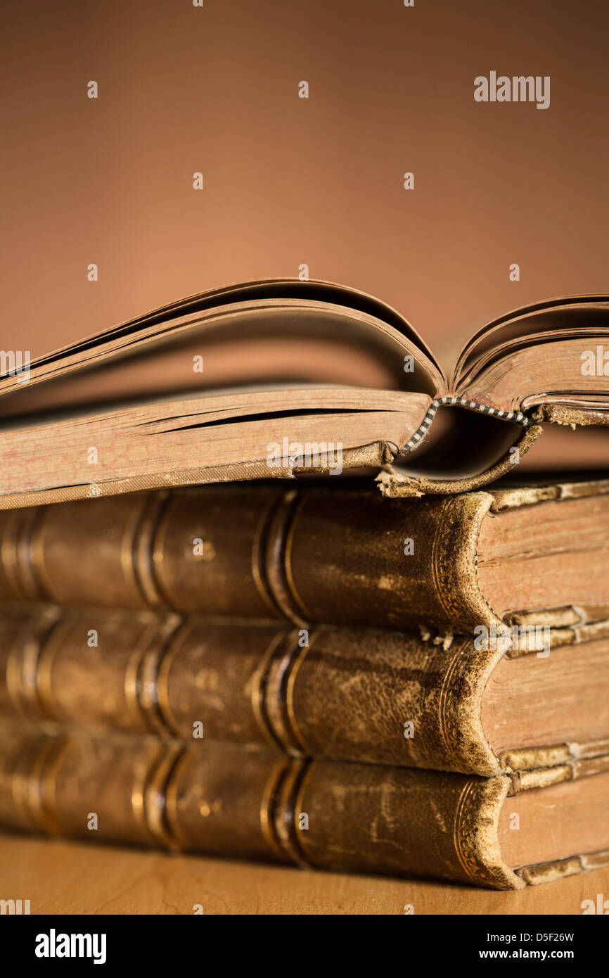 old vintage books on the table cropped with free space for your text ...