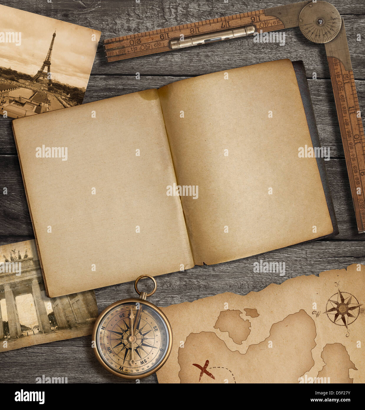 Open diary top view with old treasure map and compass Stock Photo - Alamy