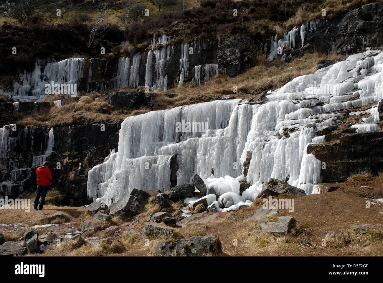 Merthyr Tydfill, UK. 31st March, 2013. A frozen waterfall beside the ...