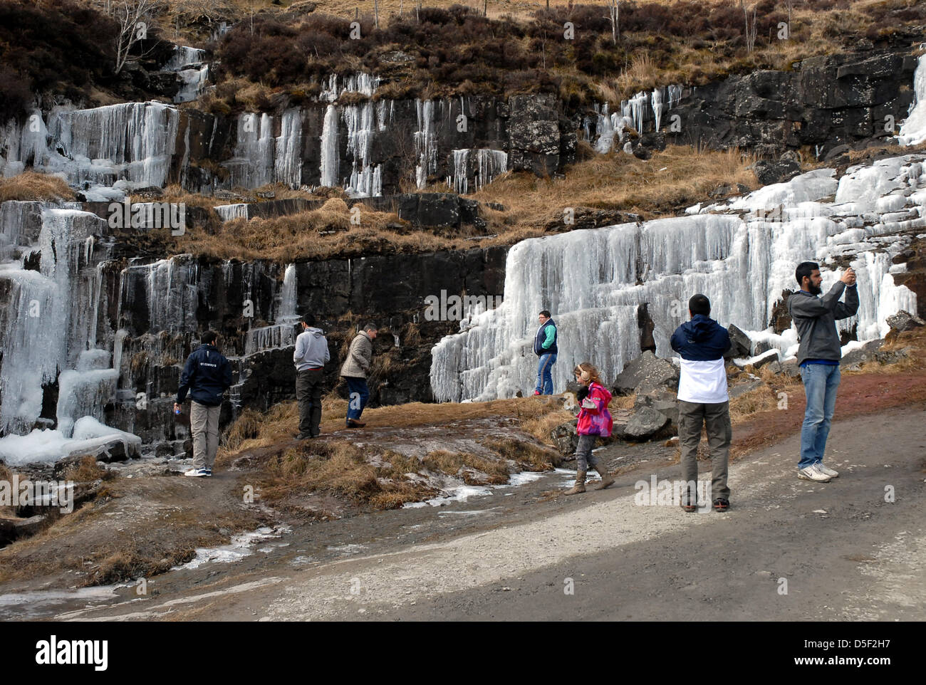 Merthyr Tydfill, UK. 31st March, 2013. A frozen waterfall beside the ...