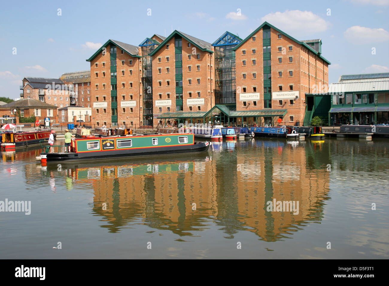 warehouses and narrow boat Gloucester Docks Gloucestershire England UK ...