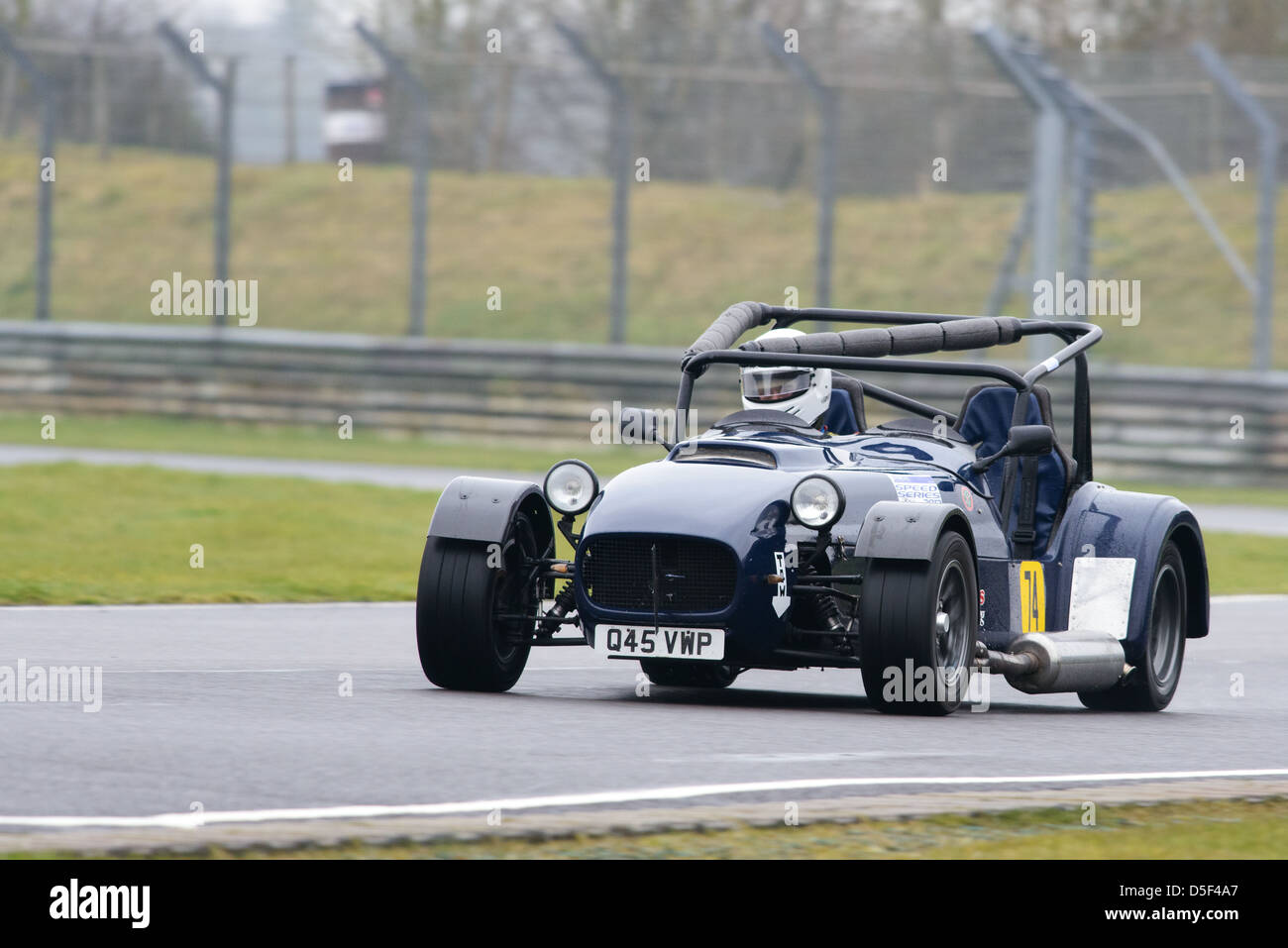 A car racing around Castle Combe Circuit at the Bristol Motor Club's ...