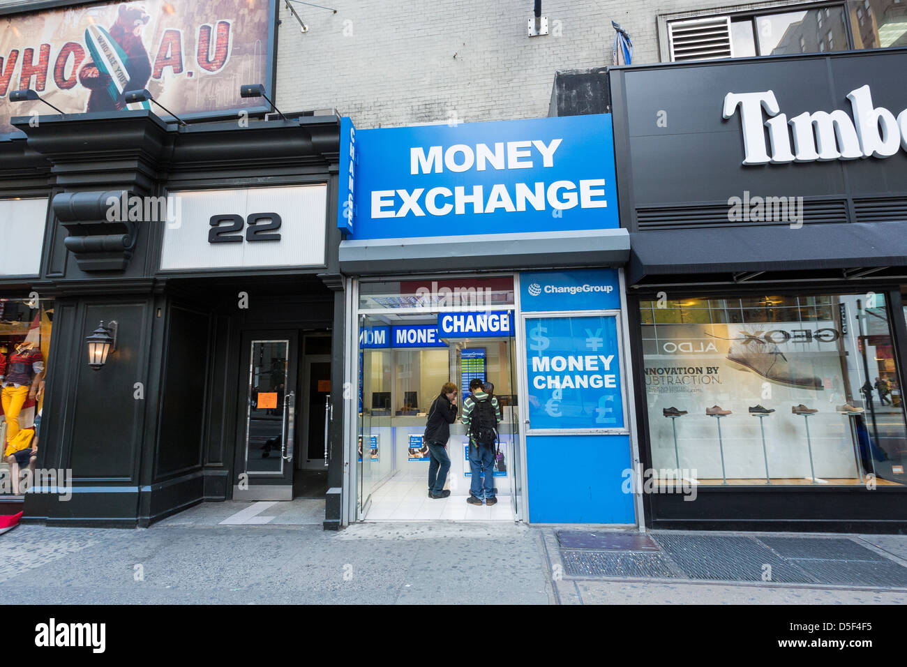 Tourists using a Money Exchange service located in Manhattan, New York ...