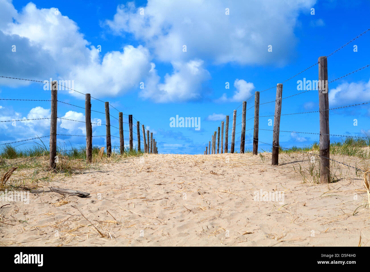 sand way to the blue sky with beautiful clouds Stock Photo - Alamy