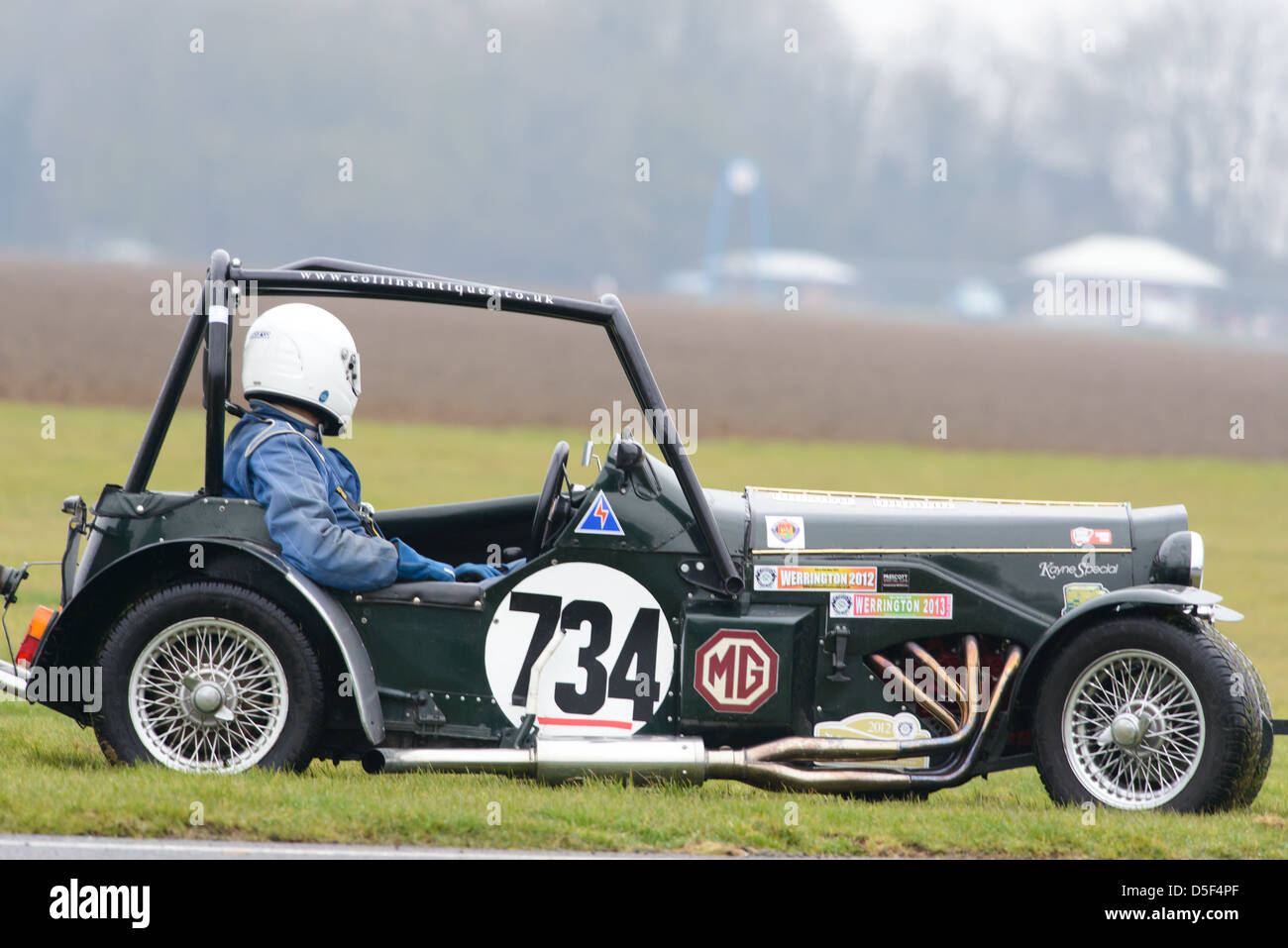 A car racing around Castle Combe Circuit at the Bristol Motor Club's ...