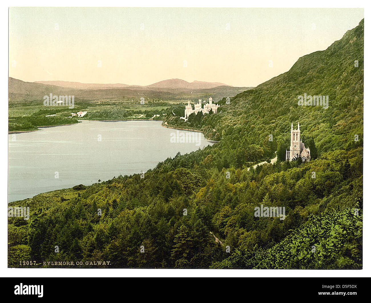 A photograph showing Kylemore Abbey and its surrounding landscape in ...
