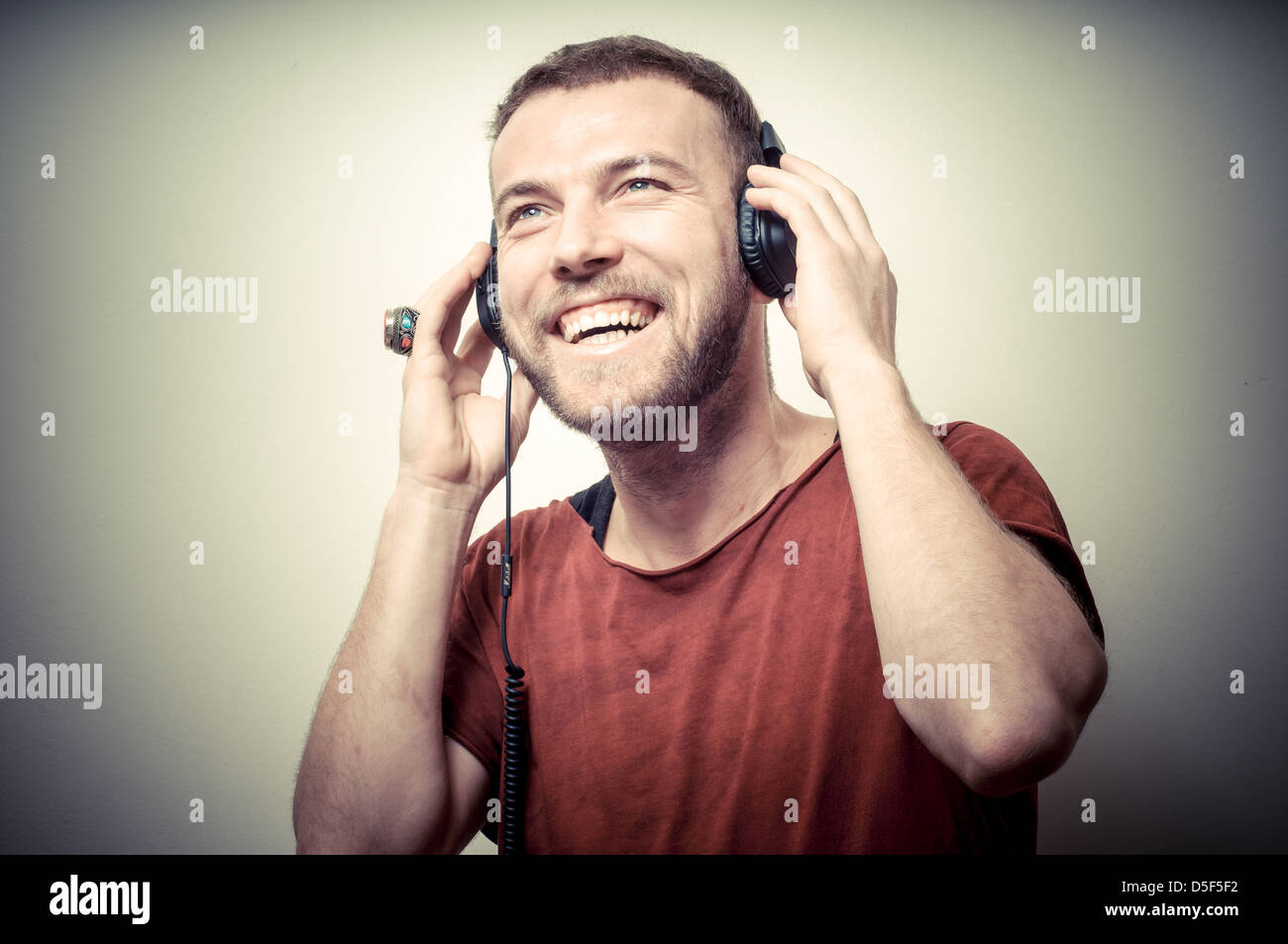 vintage portrait of fashion guy with headphones Stock Photo - Alamy