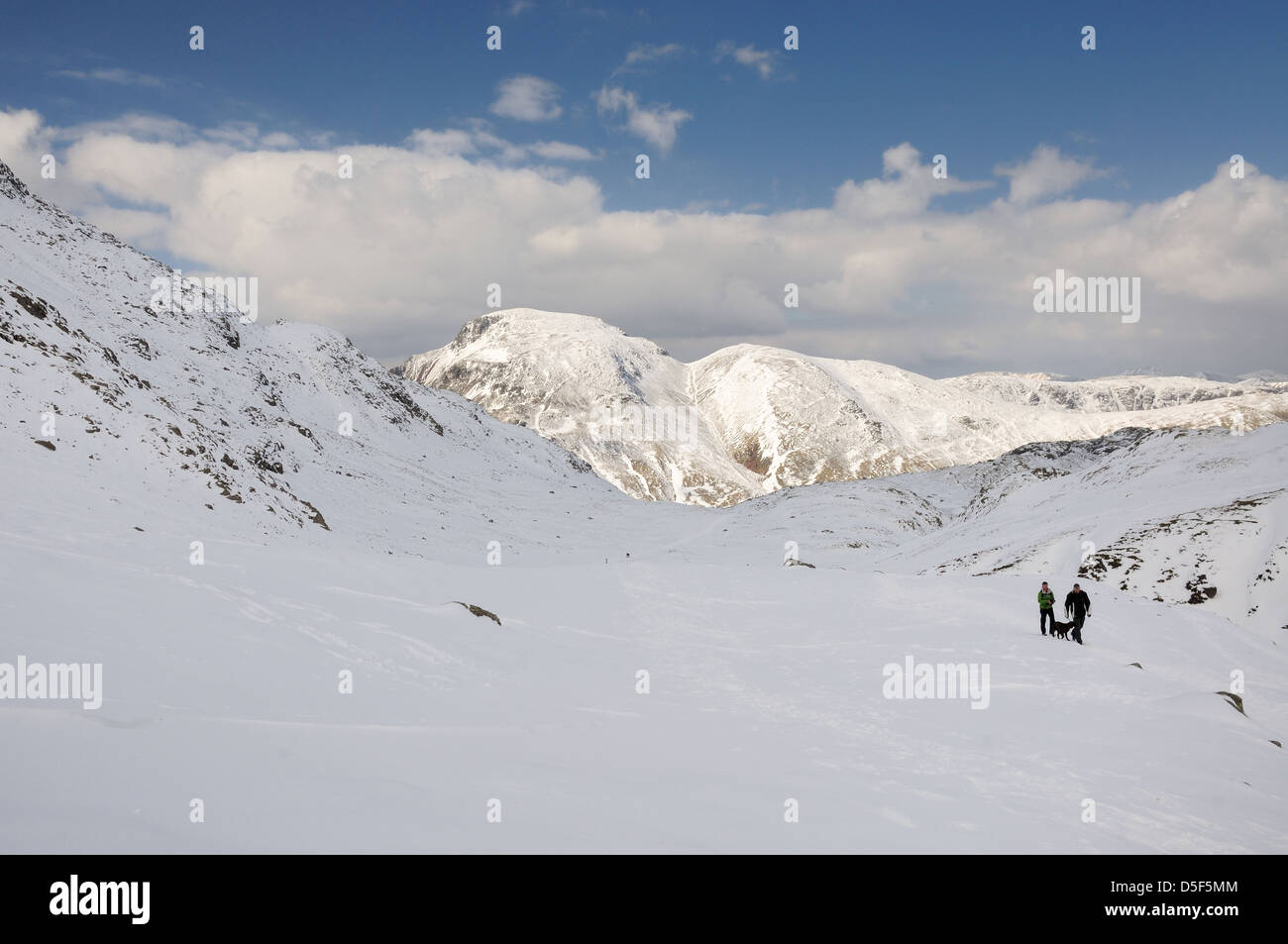 Walkers approaching Esk Hause in deep snow, with Great Gable in the ...