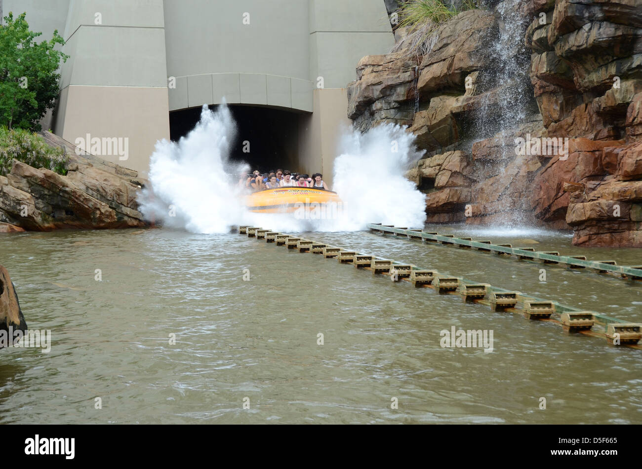 People getting wet on the Jurassic Park, the Ride at Universal Studio's ...
