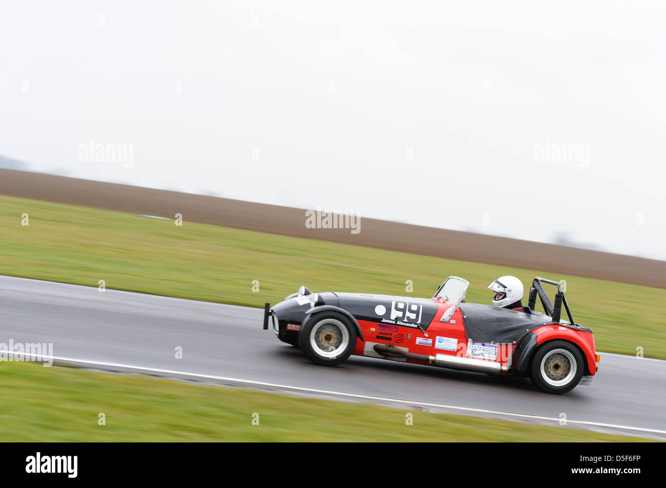 A car racing around Castle Combe Circuit at the Bristol Motor Club's ...