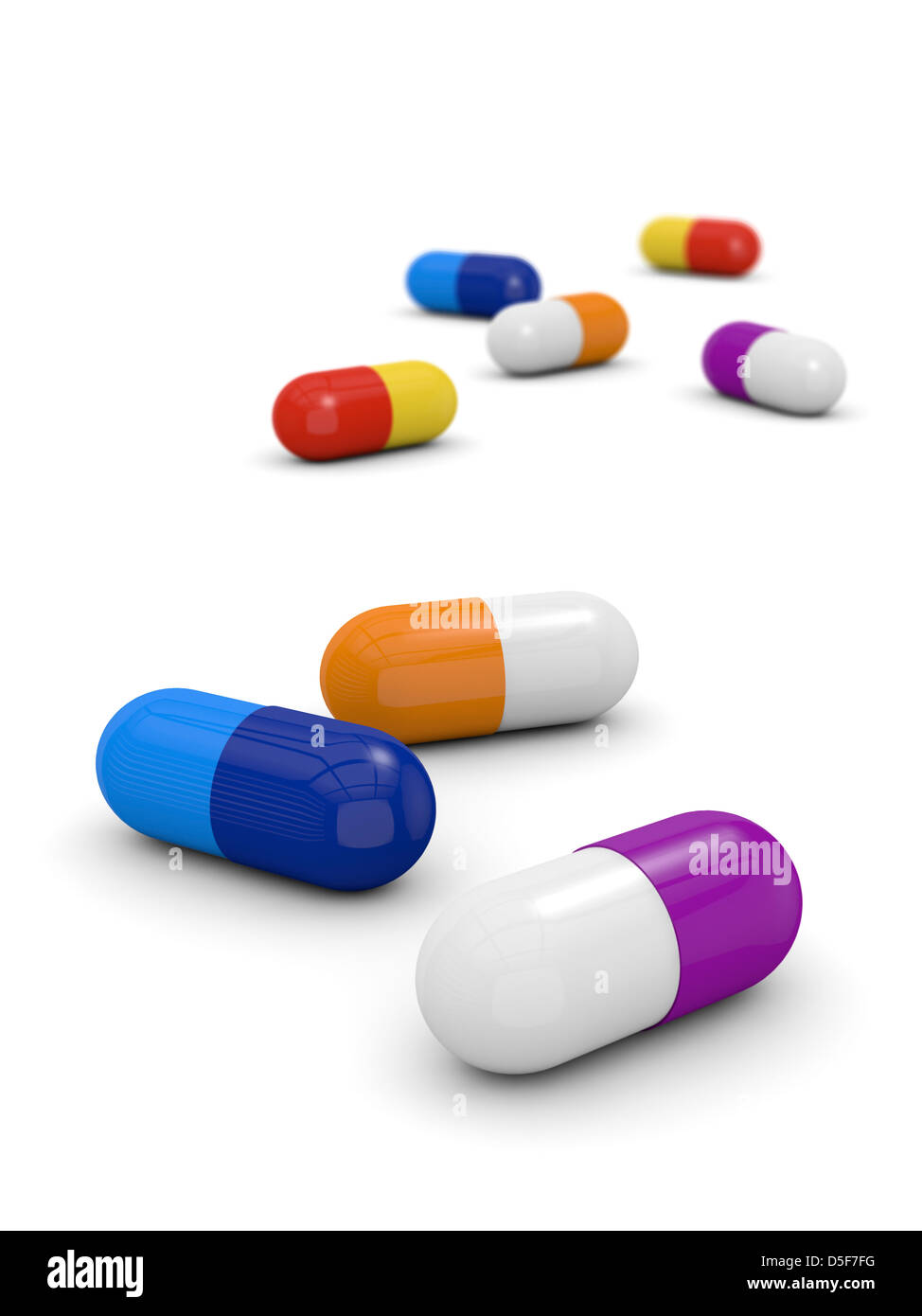 Multicolored capsules isolated on white (3D render Stock Photo - Alamy