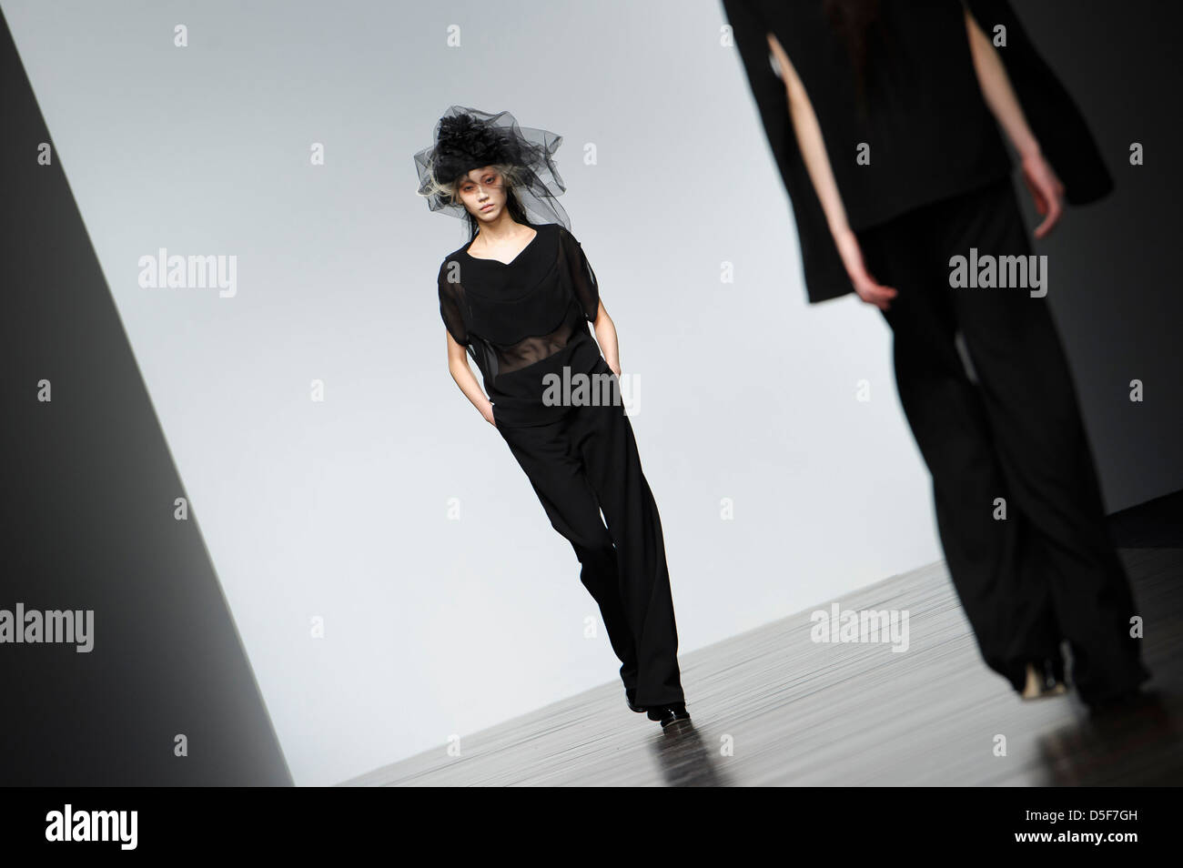 A model wears a design from the John Rocha collection during London ...