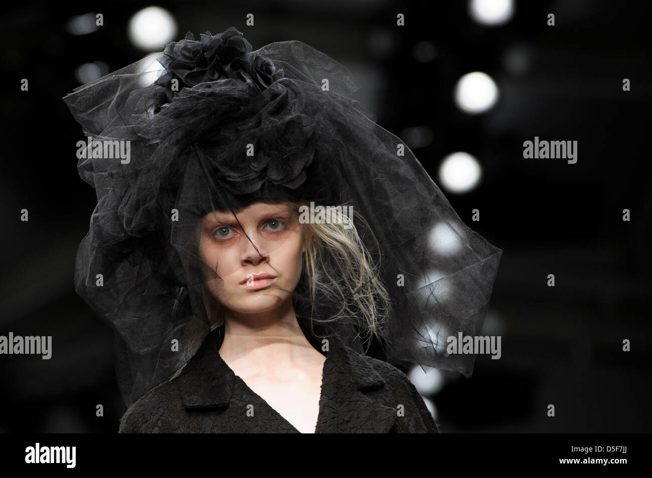 A model wears a design from the John Rocha collection during London ...