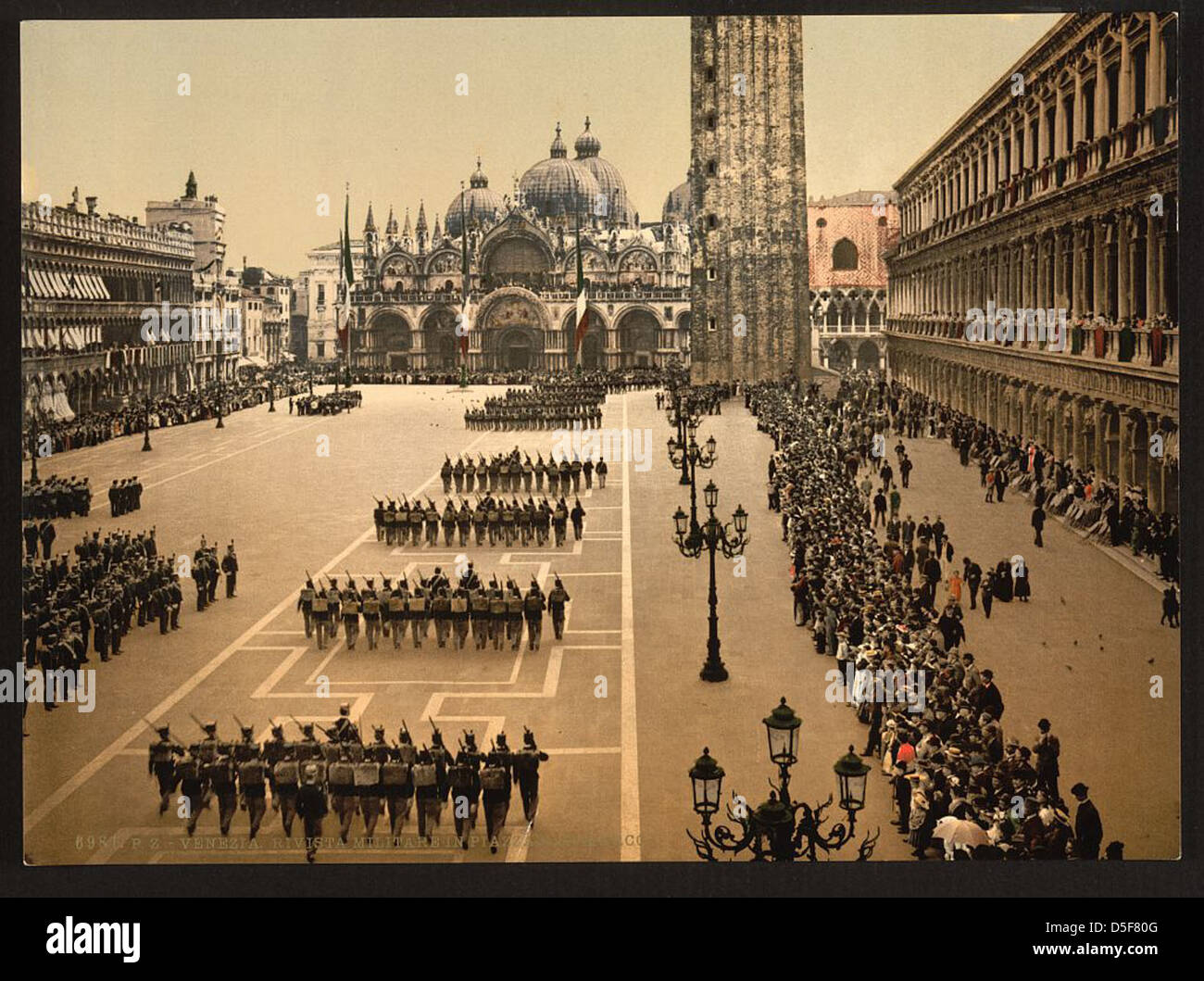 A military review takes place in St. Mark's Place, Venice, Italy ...