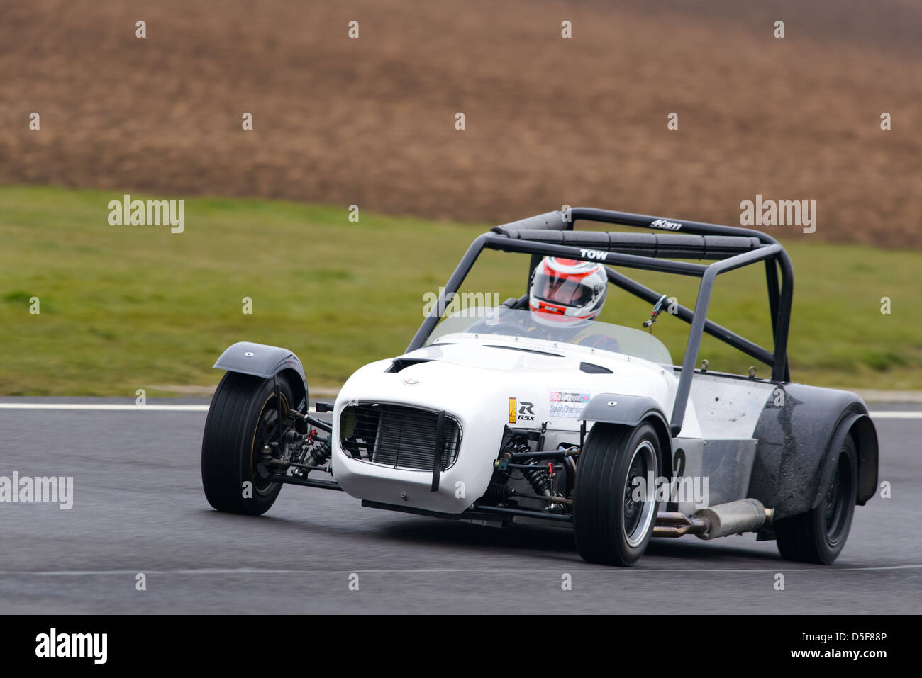 A car racing around Castle Combe Circuit at the Bristol Motor Club's ...