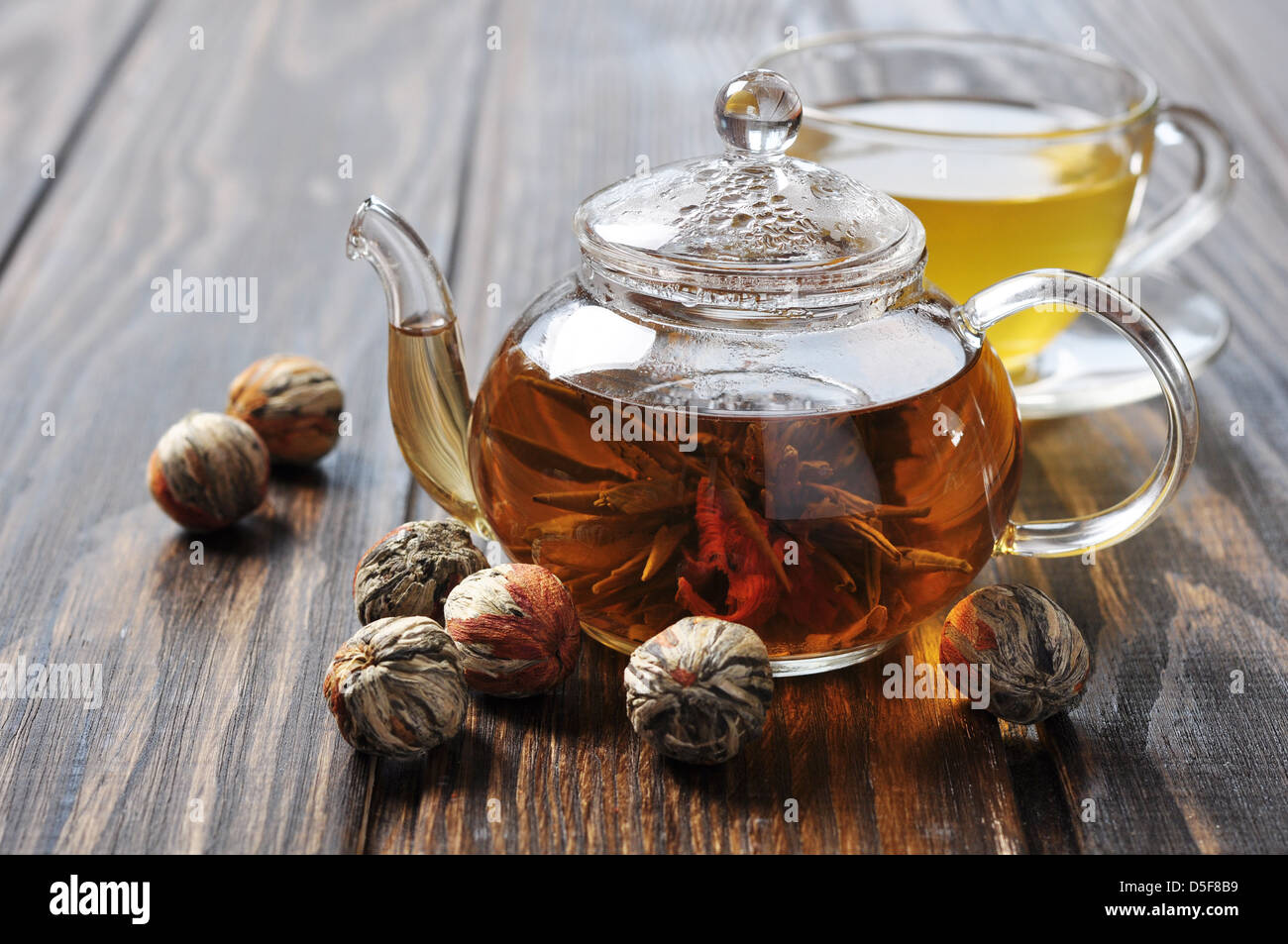 Chinese green tea with lychee in teapot on wooden background Stock ...