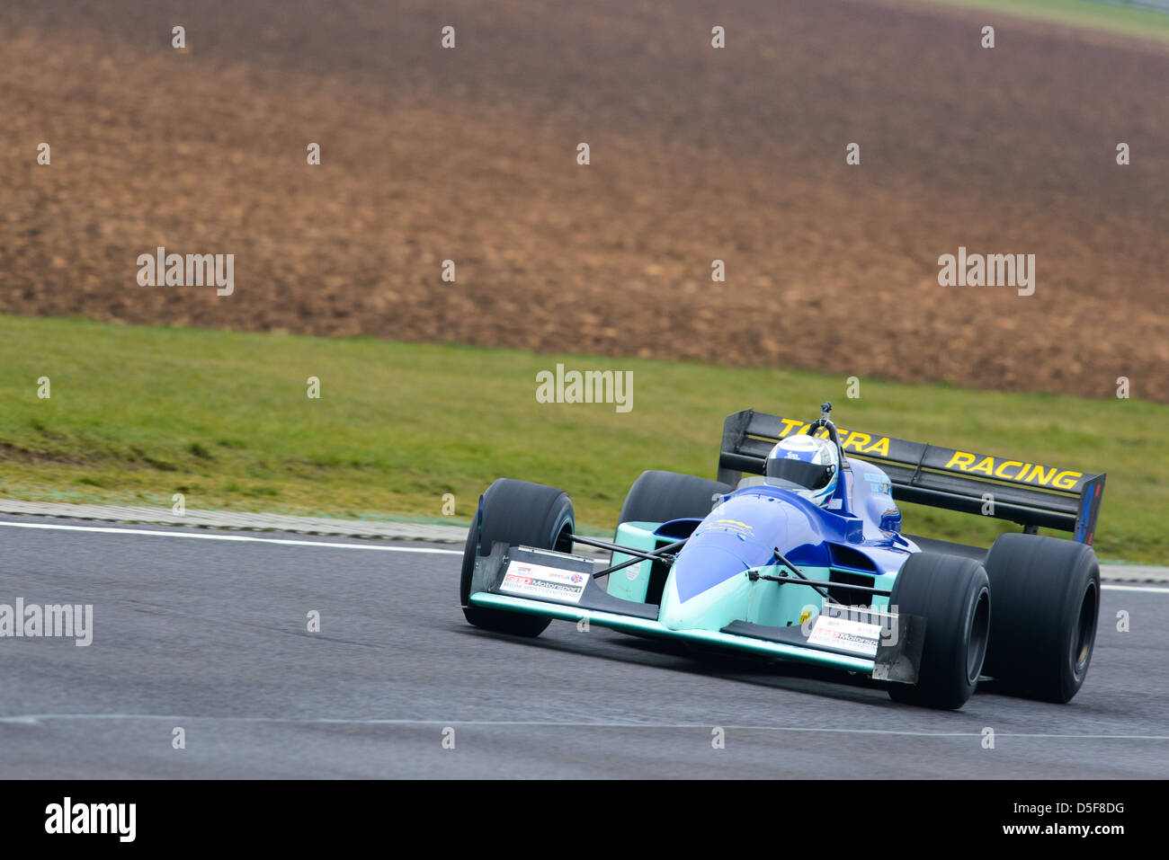 A car racing around Castle Combe Circuit at the Bristol Motor Club's ...