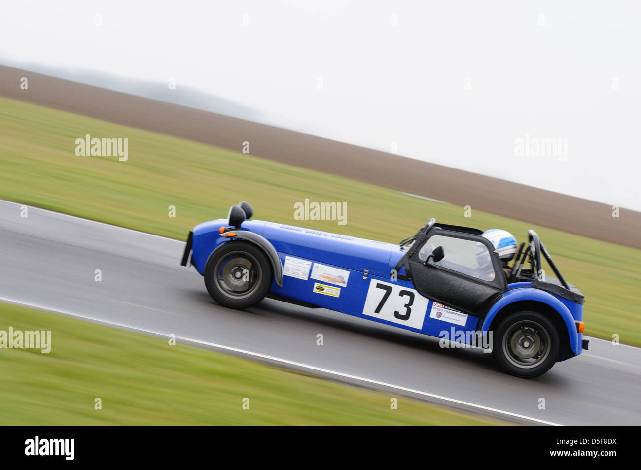 A car racing around Castle Combe Circuit at the Bristol Motor Club's ...