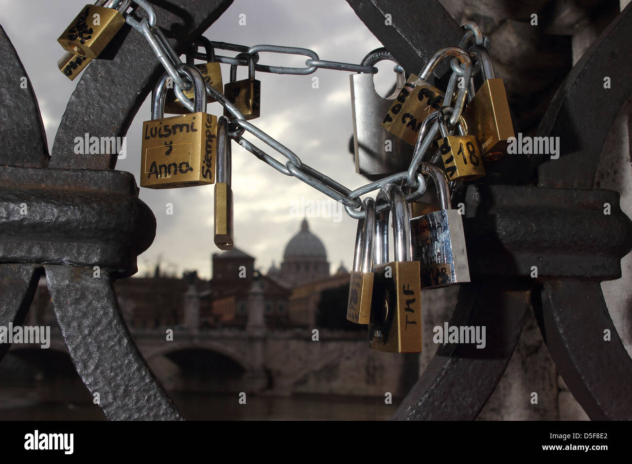 Padlocks locked in a bridge in Rome (Ethernal Town) to promise ethernal ...