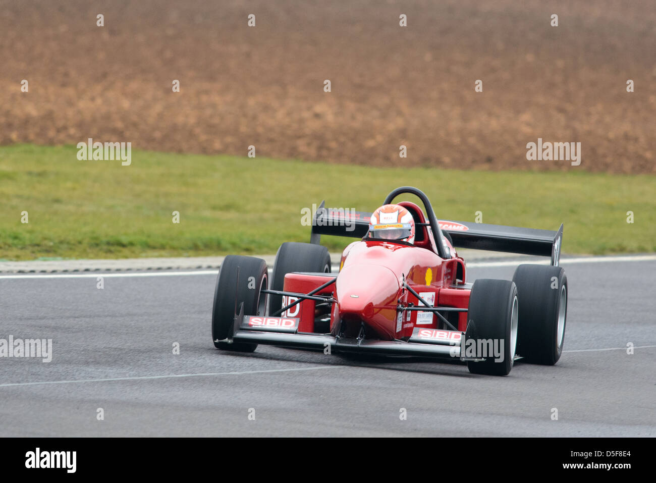 A car racing around Castle Combe Circuit at the Bristol Motor Club's ...