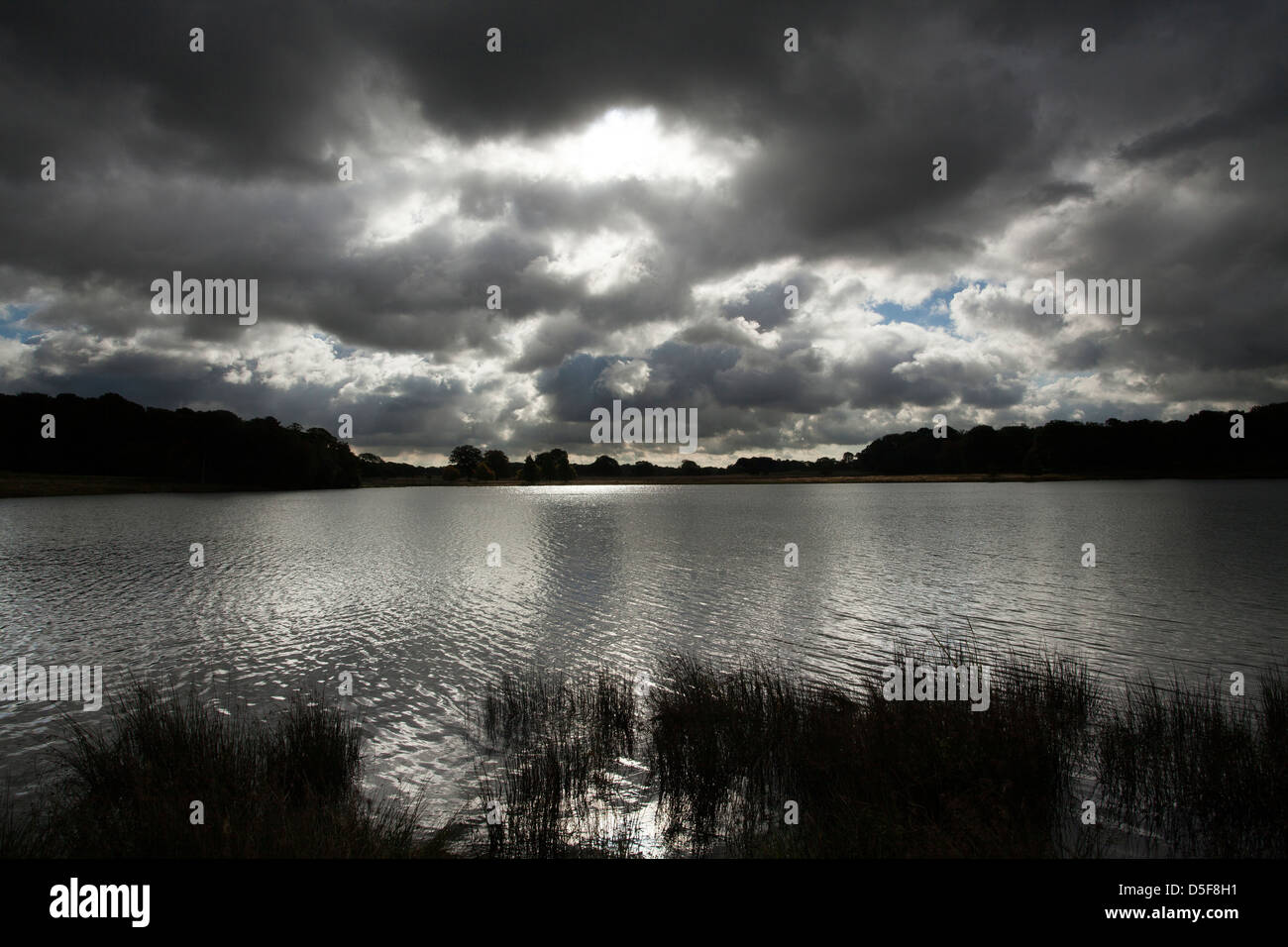 Grey clouds over water hi-res stock photography and images - Alamy
