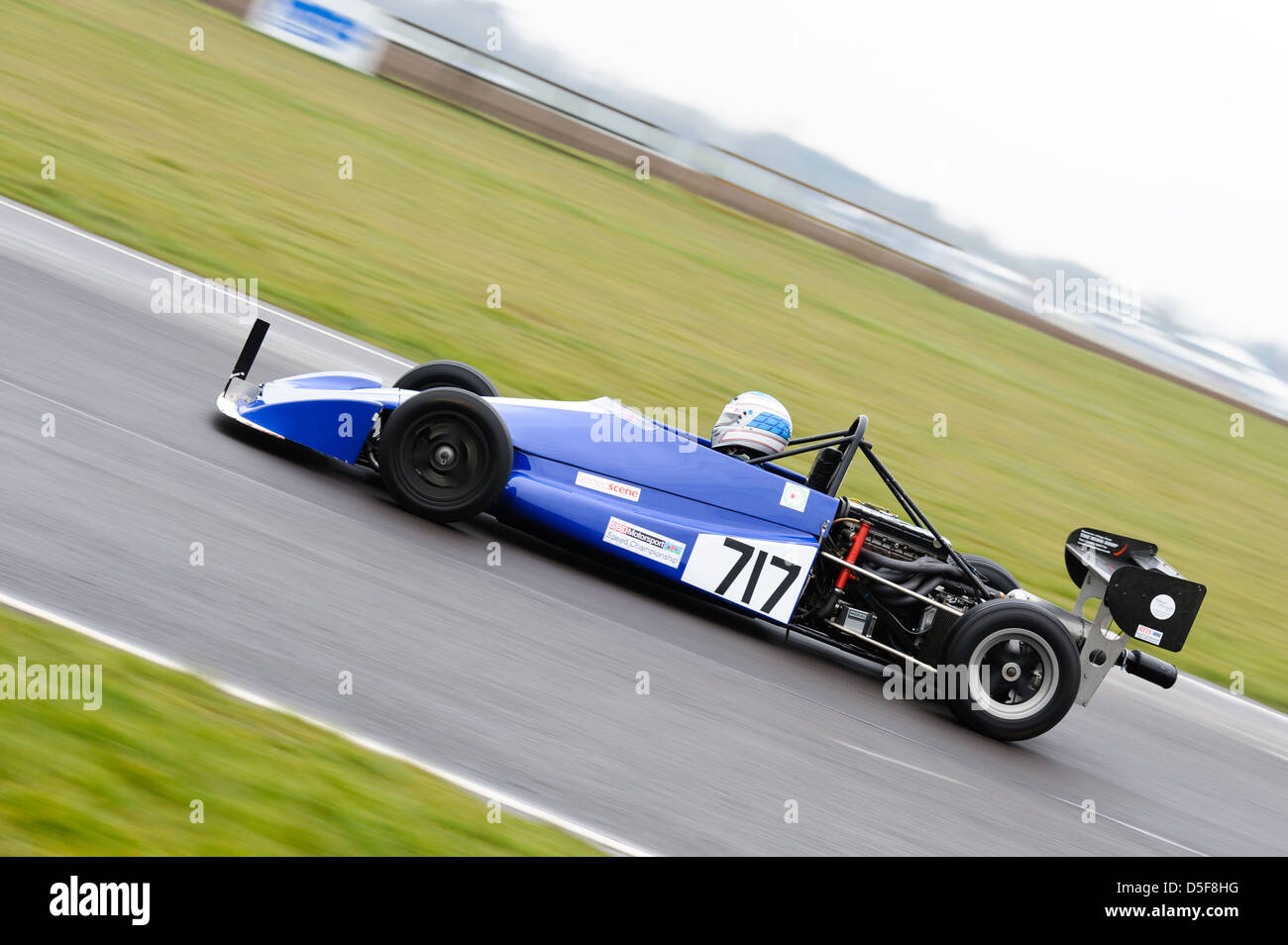 A car racing around Castle Combe Circuit at the Bristol Motor Club's ...