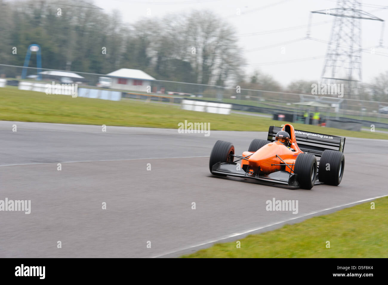 A car racing around Castle Combe Circuit at the Bristol Motor Club's ...