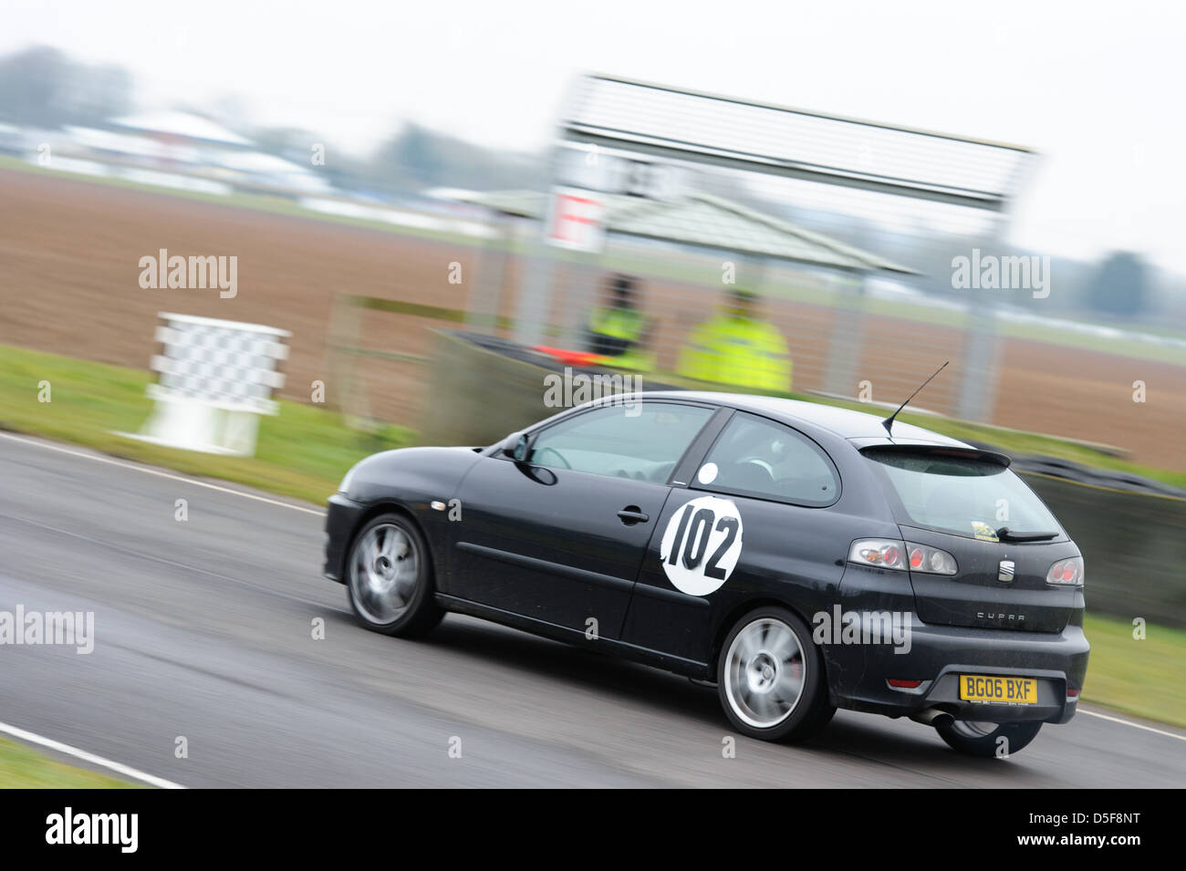 A car racing around Castle Combe Circuit at the Bristol Motor Club's ...