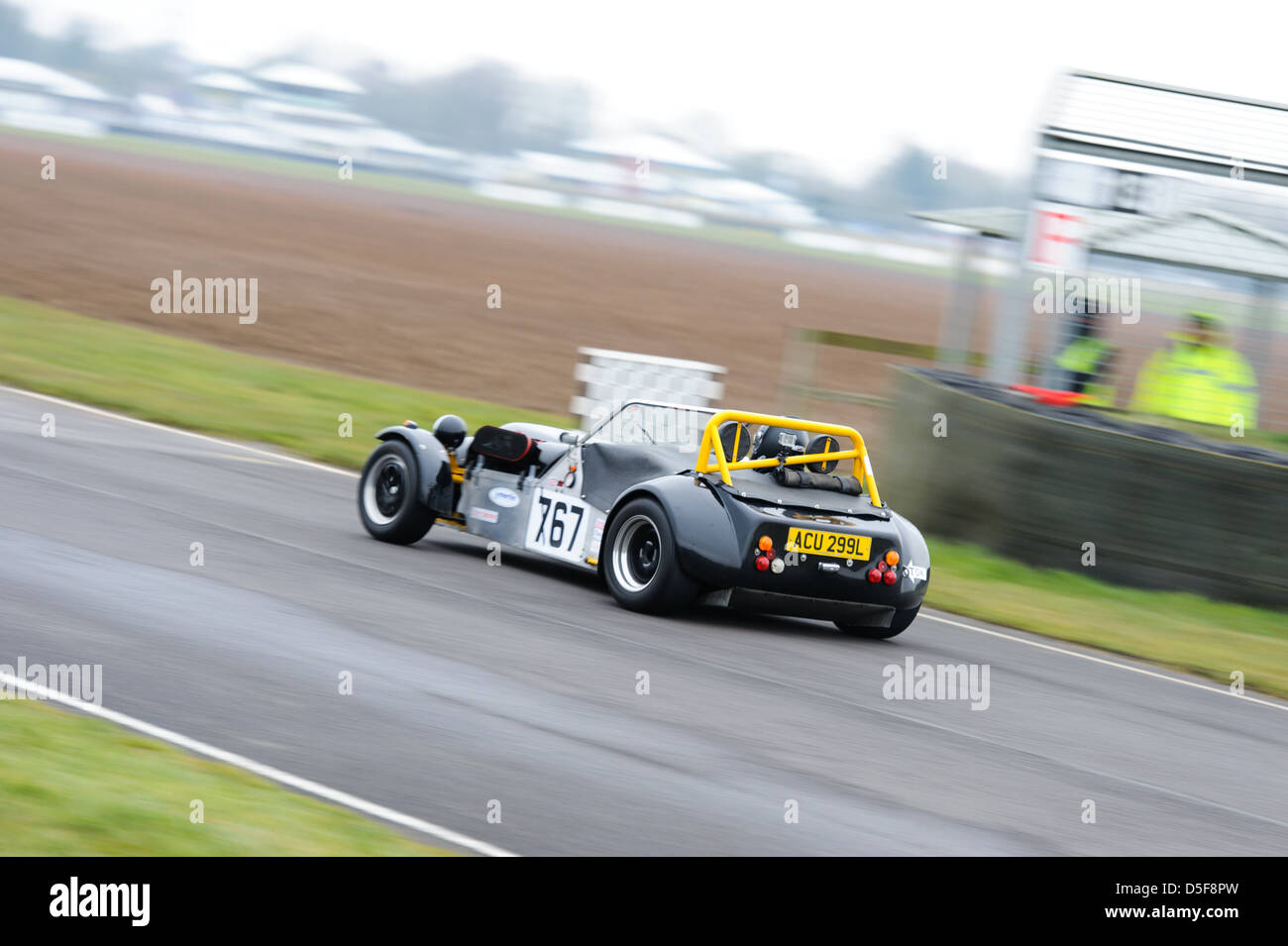 A car racing around Castle Combe Circuit at the Bristol Motor Club's ...